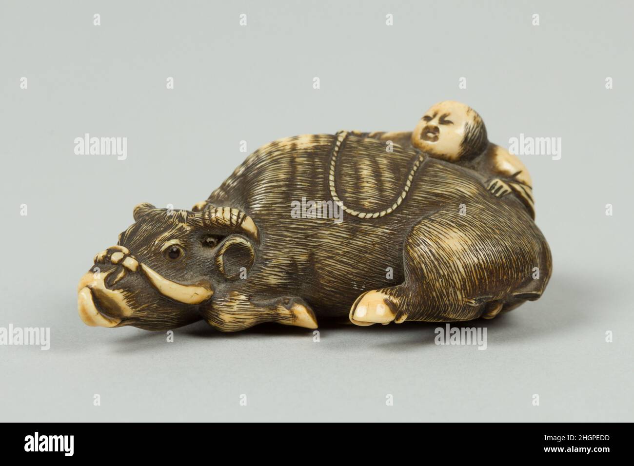 Netsuke of Boy Climbing over the Back of a Cow 18th century Japan ...