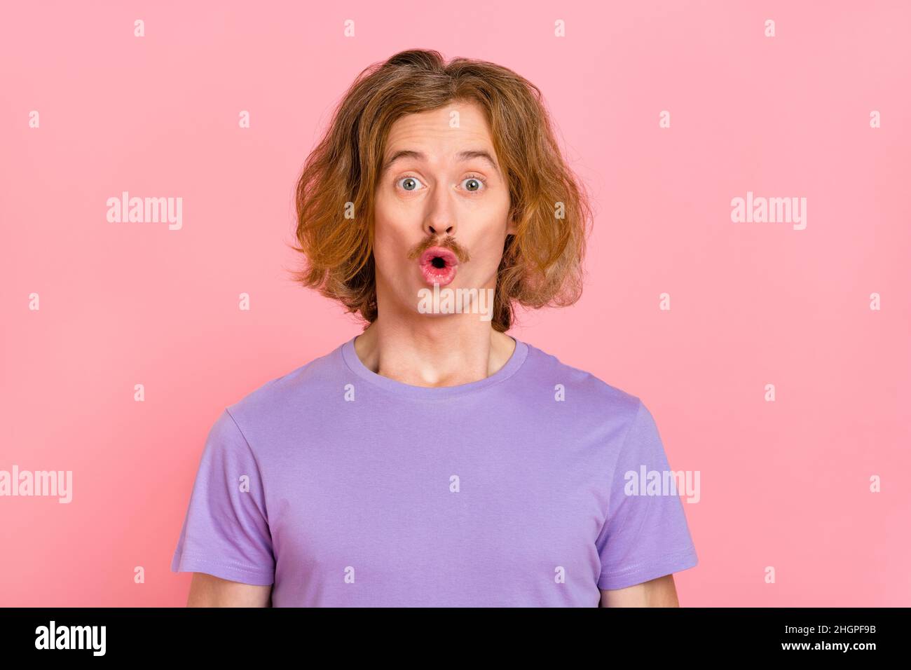 Portrait of attractive impressed red-haired guy sudden news reaction ...