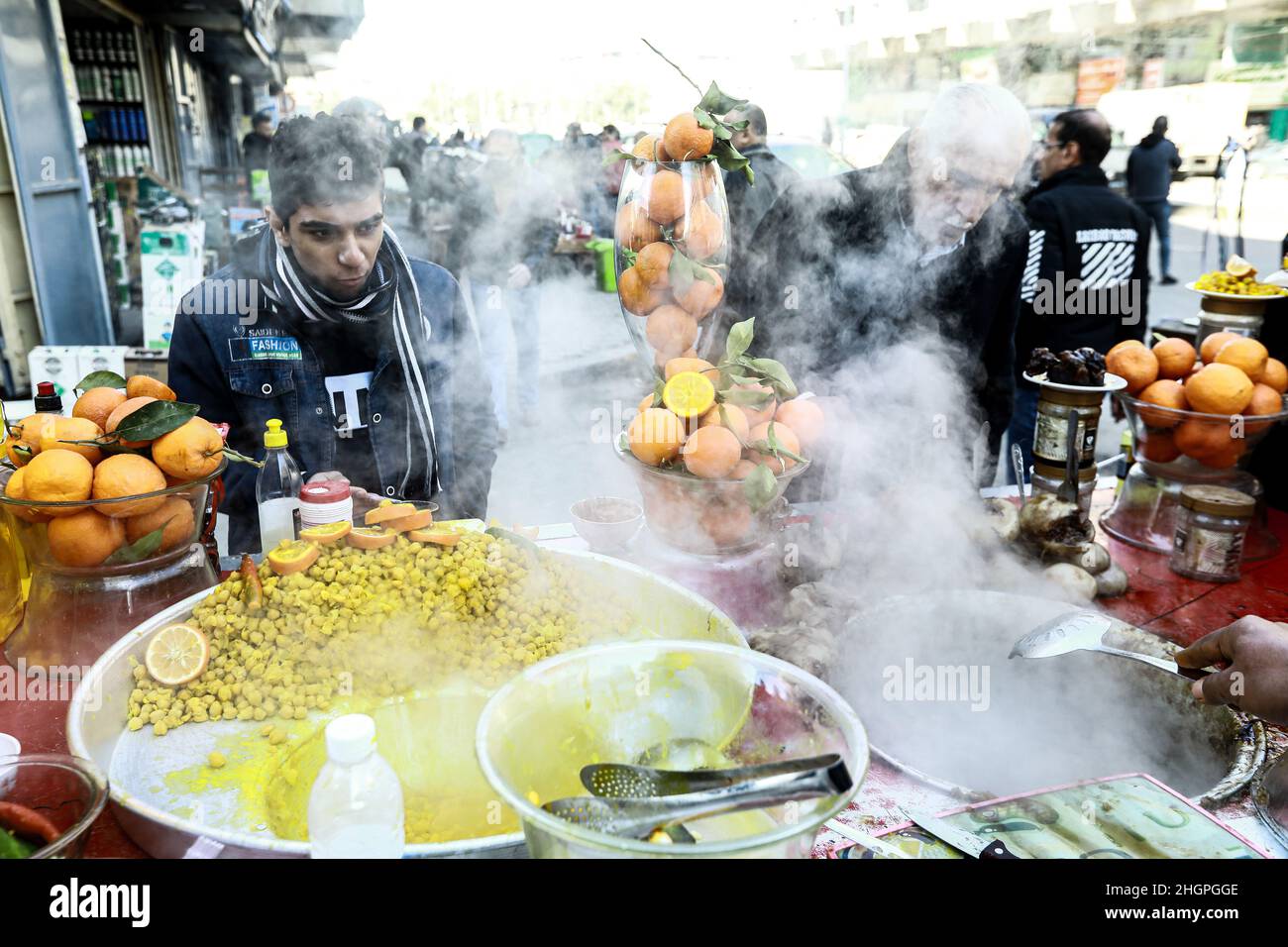 Baghdad, Iraq. 22nd Jan, 2022. An Iraqi vendor prepares 'Lablabi', a ...