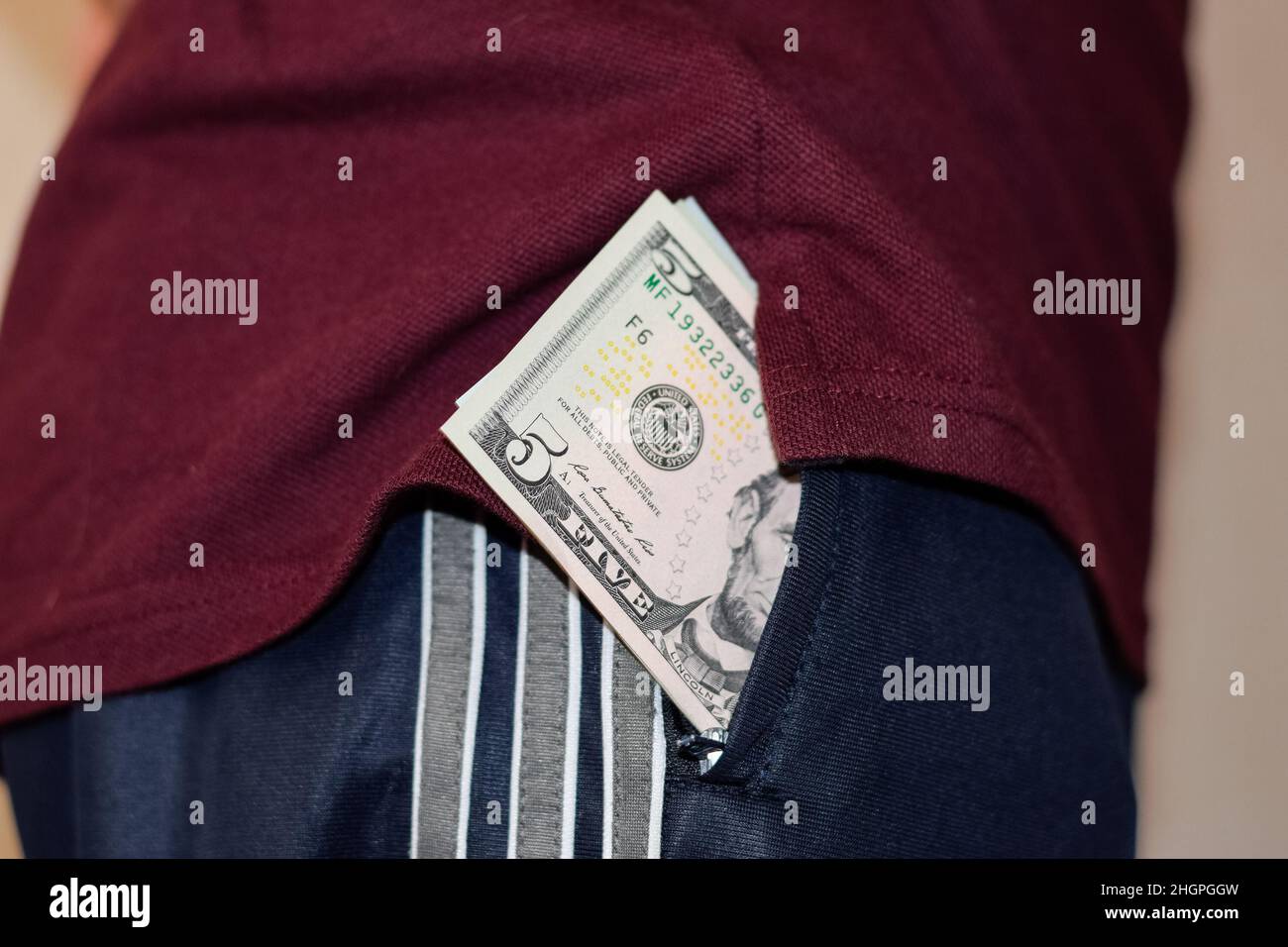 Hiding cash in pocket hi-res stock photography and images - Alamy