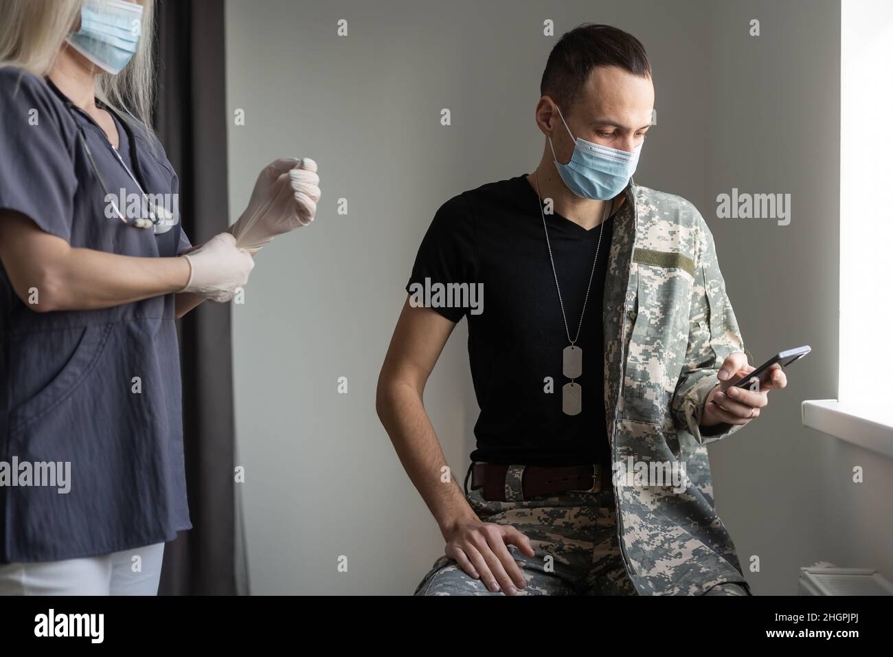soldier getting vaccine shot during corona virus pandemic. Military ...