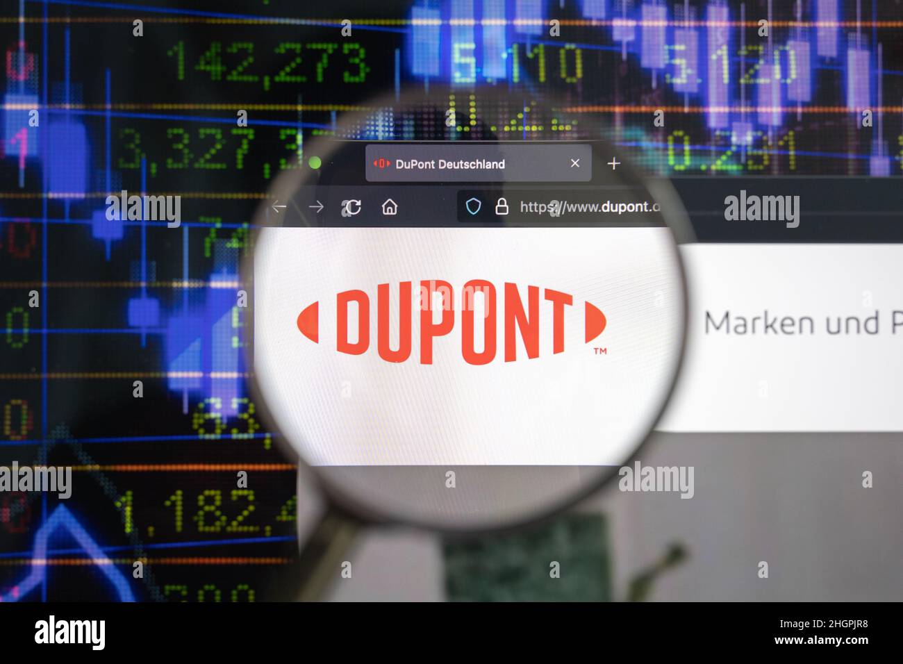 Dupont company logo on a website with blurry stock market developments ...