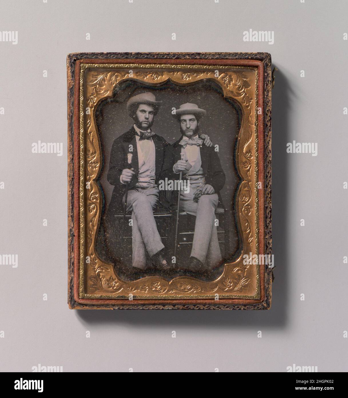 [Two Seated Young Men Holding Ivory-topped Walking Sticks] 1850s ...