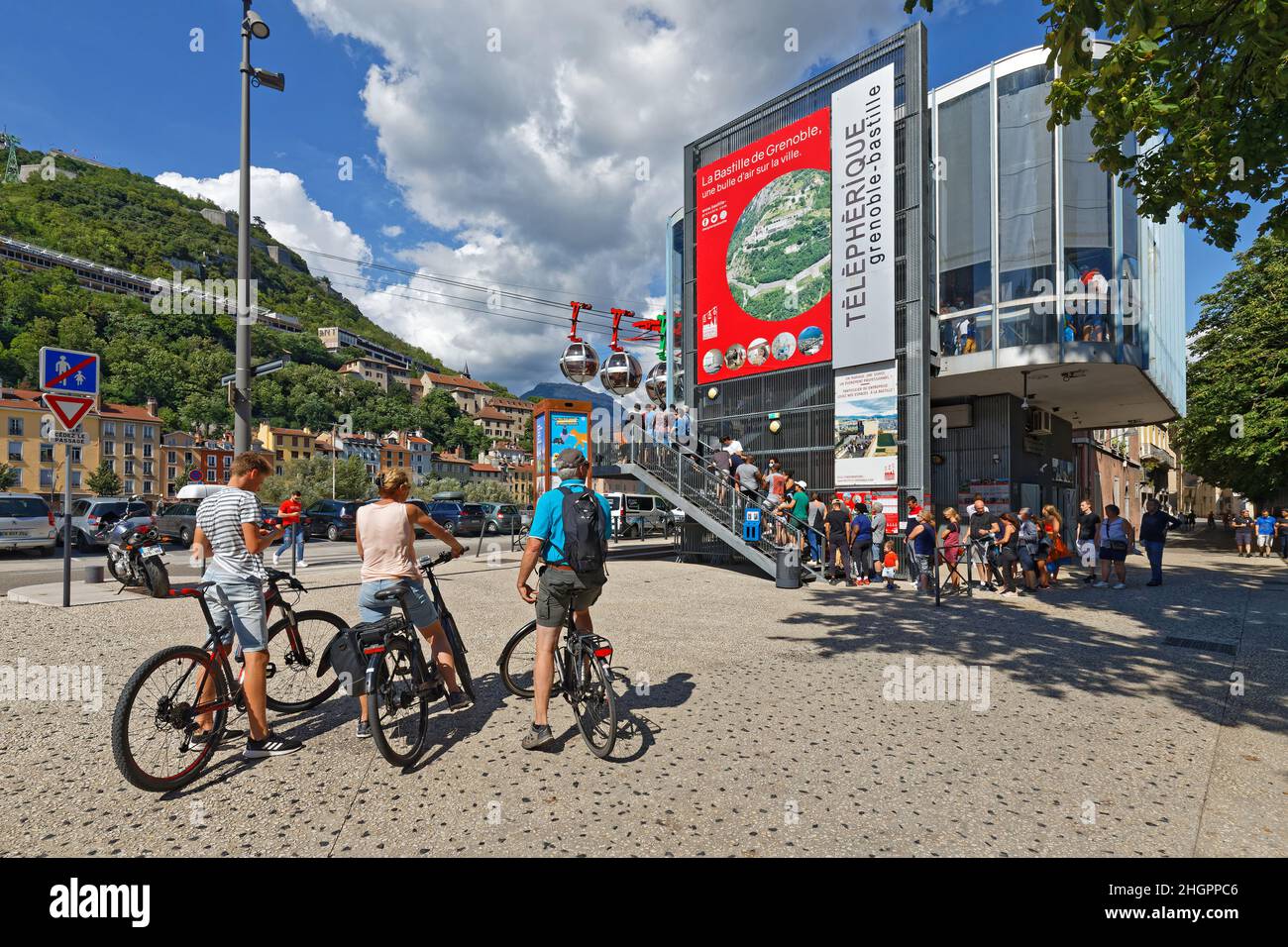 GRENOBLE, FRANCE, August 2, 2021 : Tourists wait for the start of cable ...