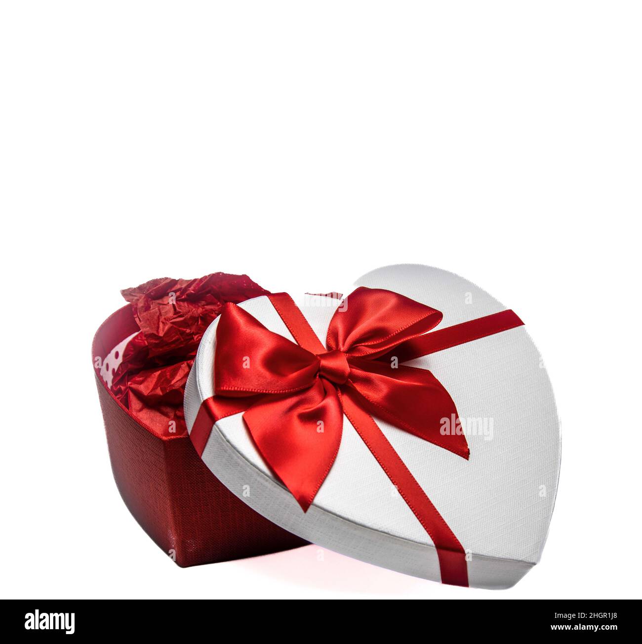 A single empty heart shaped box on a white background with copy space ...