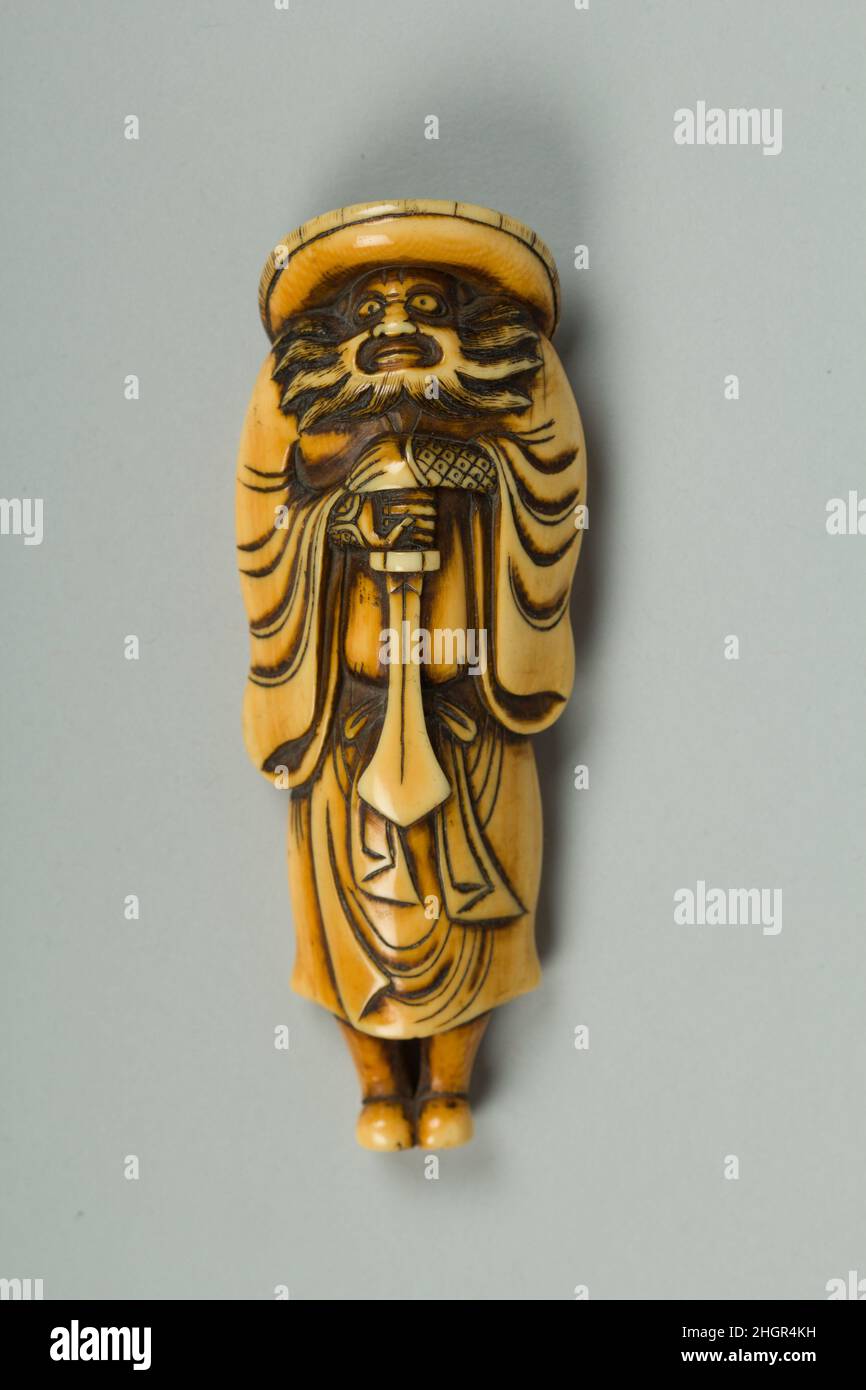 Netsuke of a Man Carrying a Sword 19th century Japan. Netsuke of a Man ...