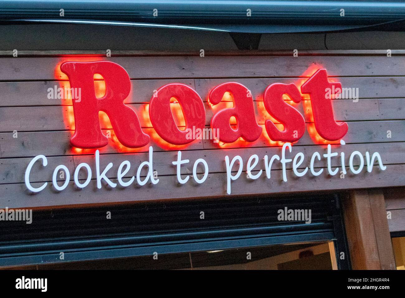 Red Roast Business sign; Cooked to perfection in Preston, UK Stock ...