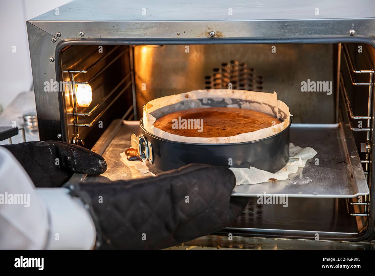 Cooking process homemade Basque burnt cheesecake. Ready toasted san ...