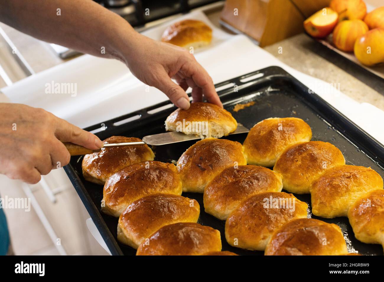 Home baking. Woman baking pies. Pies just from oven Stock Photo - Alamy