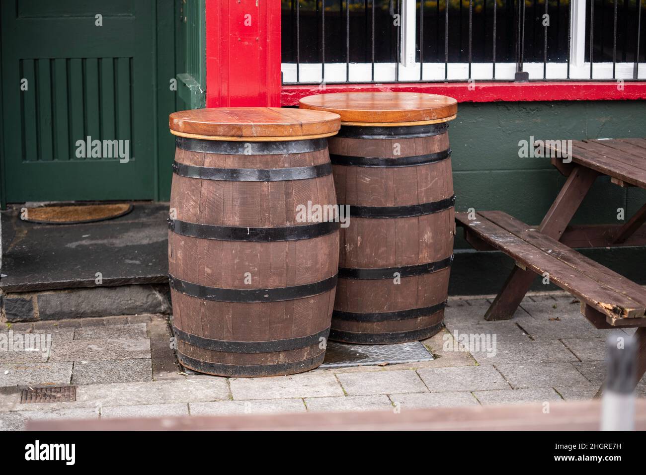 Wooden old barrel with top barrel table,standing in the street Stock ...