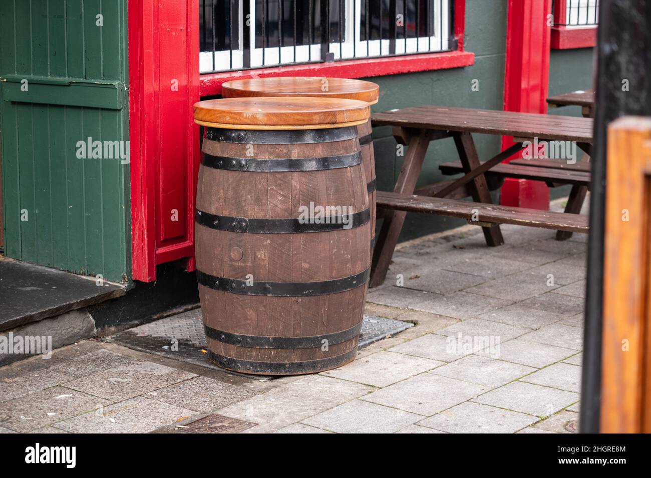Wooden old barrel with top barrel table,standing in the street Stock ...