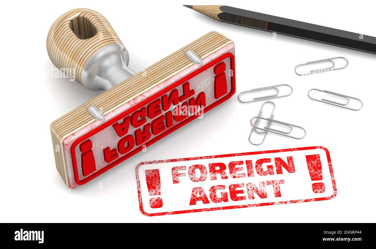 Foreign agent. The stamp and red imprint FOREIGN AGENT on a white ...