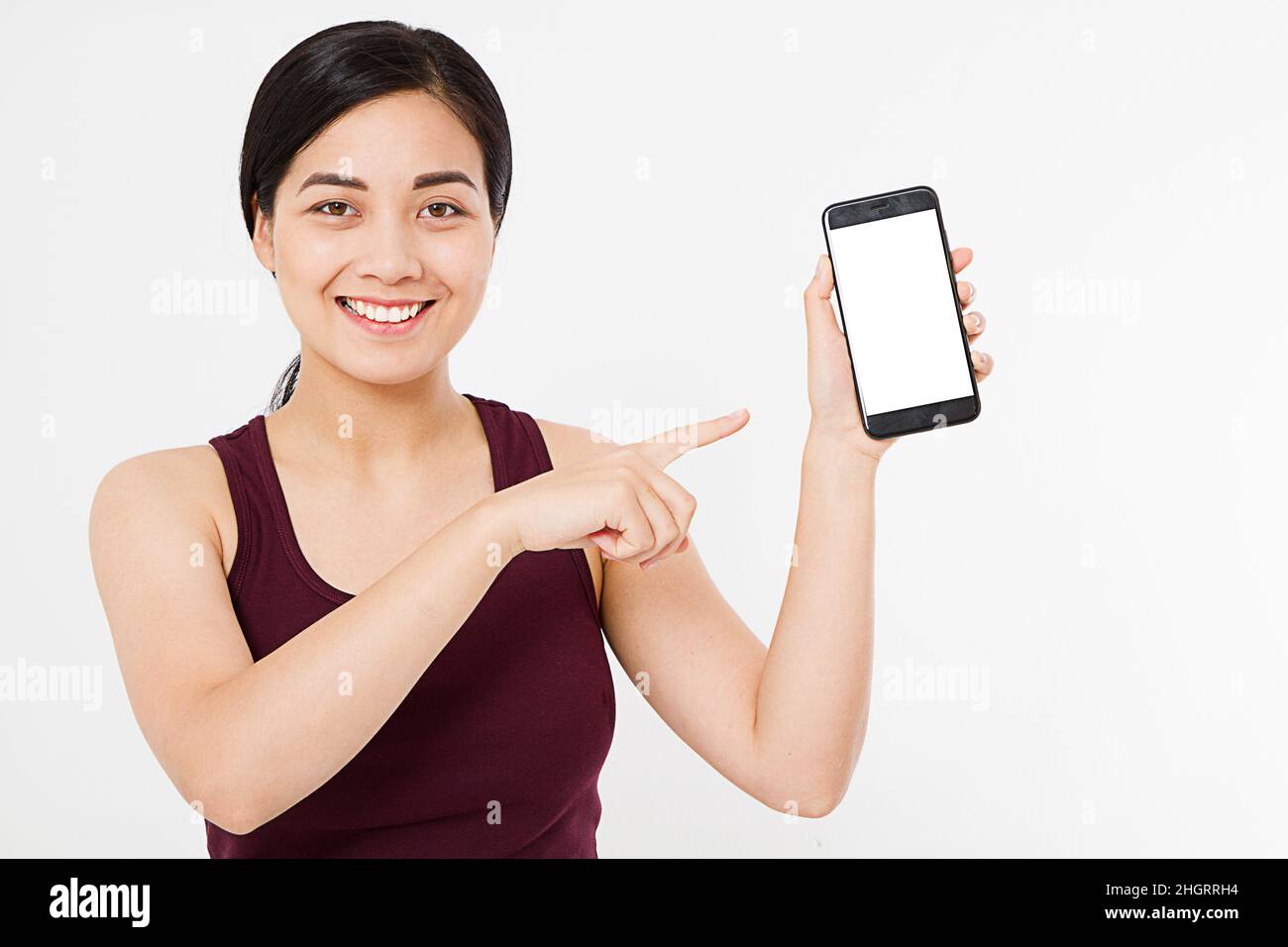 asian,korean woman hold blank screen cellphone, pointing isolated on ...