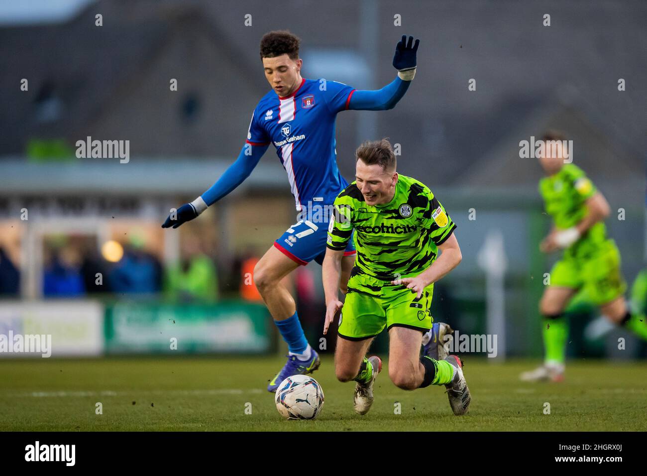 Forest Green Rovers Regan Hendry right tackled by Carlisle United's ...