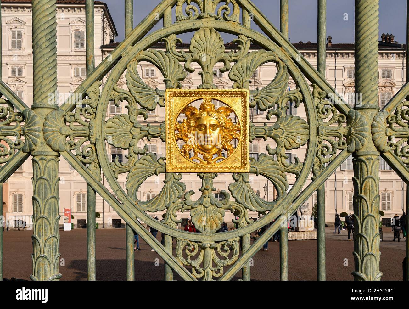 Detail of the monumental gate of Palazzo Reale, decorated with a golden ...