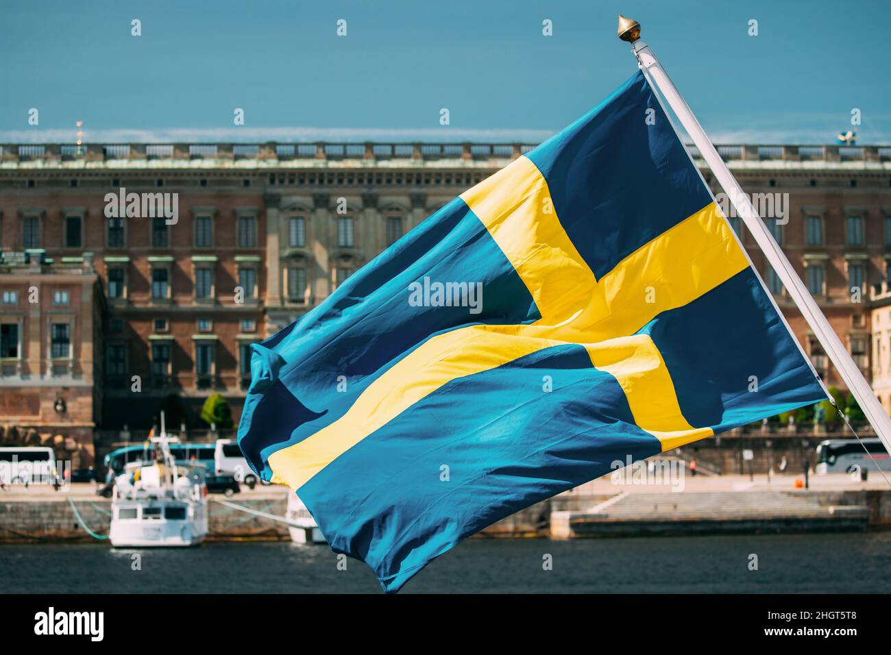 Stockholm, Sweden. Waving Swedish Flag In Stockholm Street. Stockholm ...