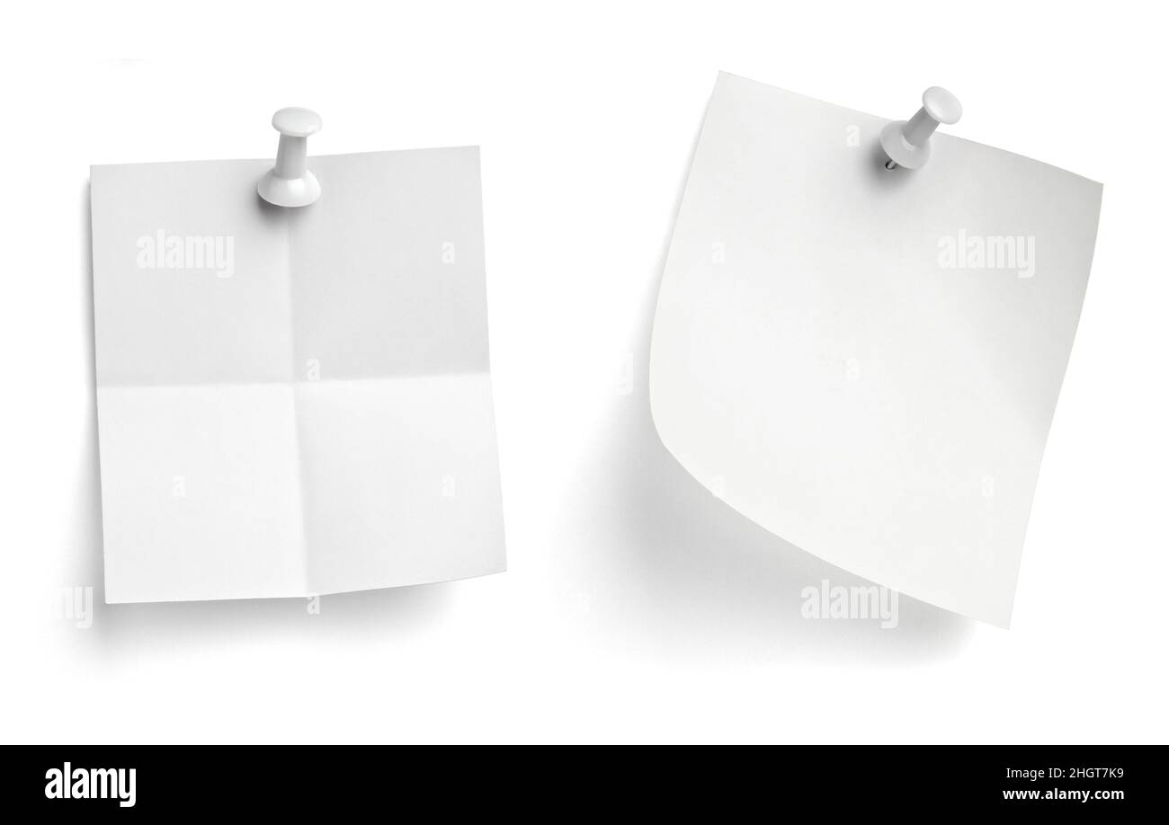 collection of various note paper with a push pin on white background ...