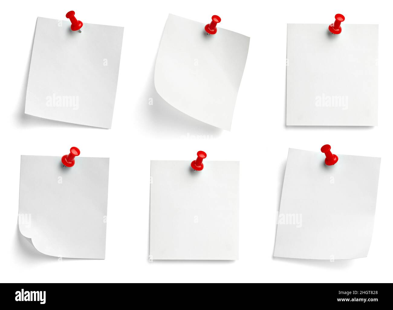 collection of various note paper with a push pin on white background ...