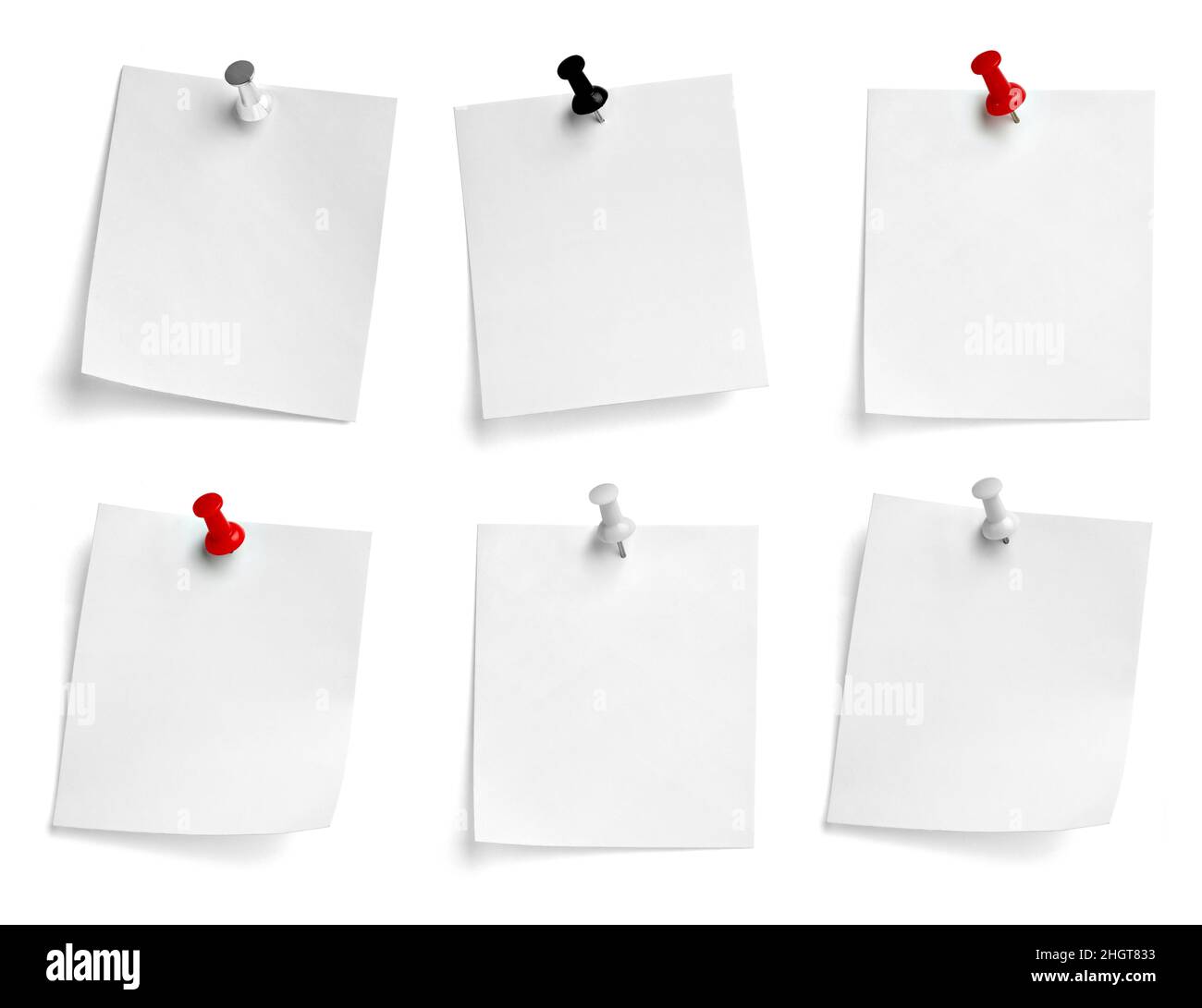 collection of various note paper with a push pin on white background ...