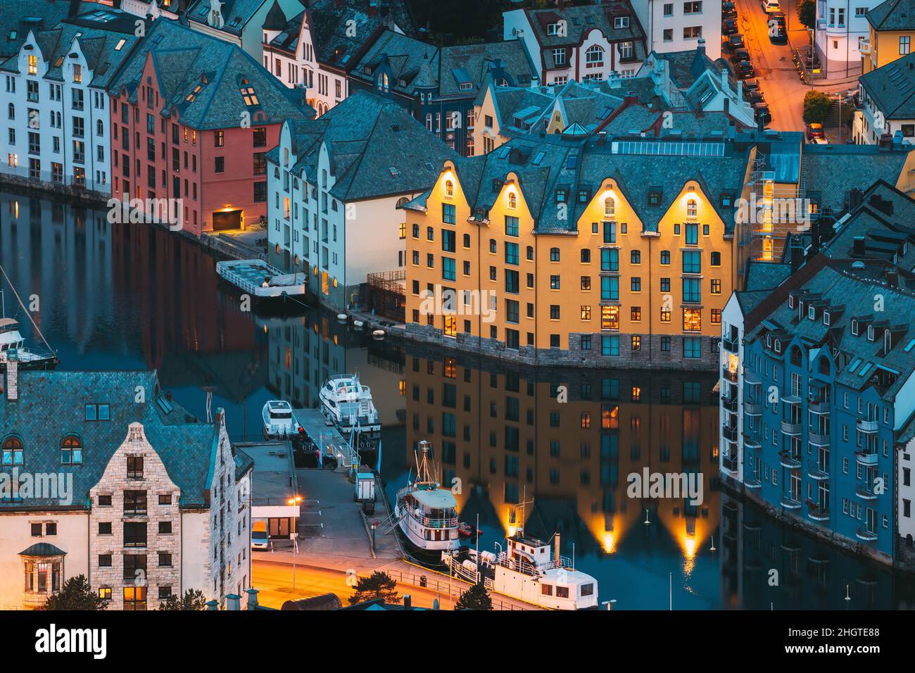 Alesund, Norway. Night View Of Alesund Skyline Cityscape. Historical ...