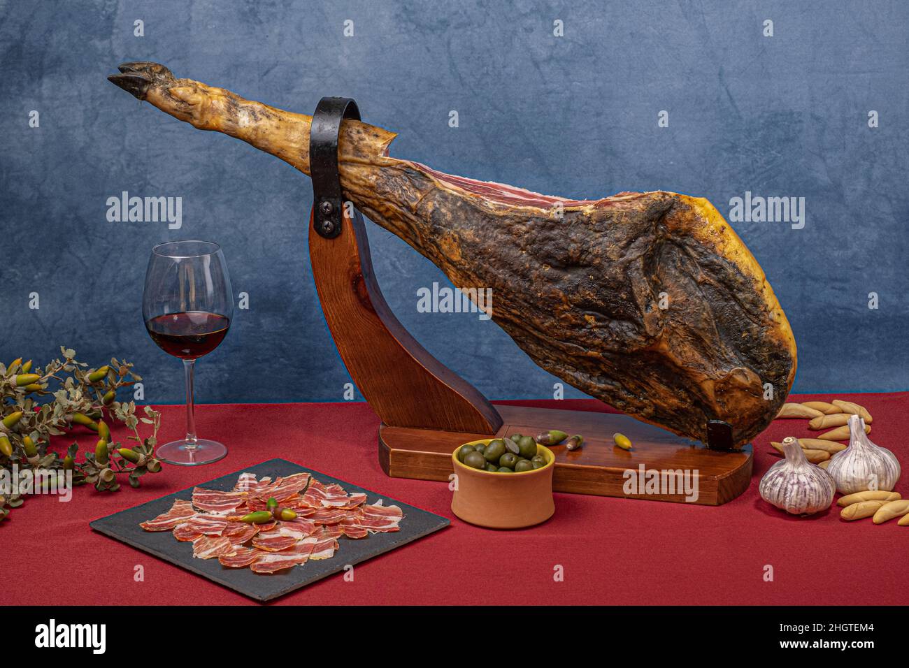 Ham holder with pata negra serrano ham Stock Photo - Alamy