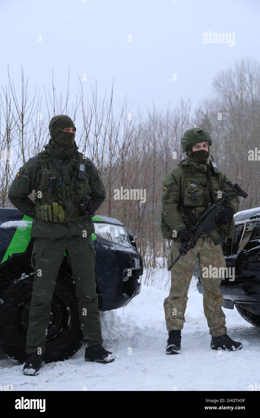 Kurmelionys, Lithuania. 21st Jan, 2022. A Lithuanian border guard and ...