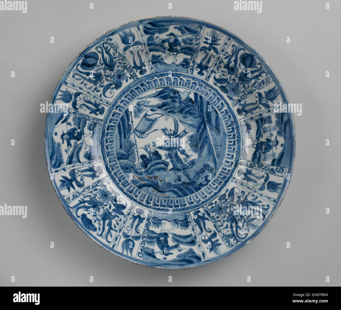 Dish with warrior China The dramatic warrior with two axes depicted in ...