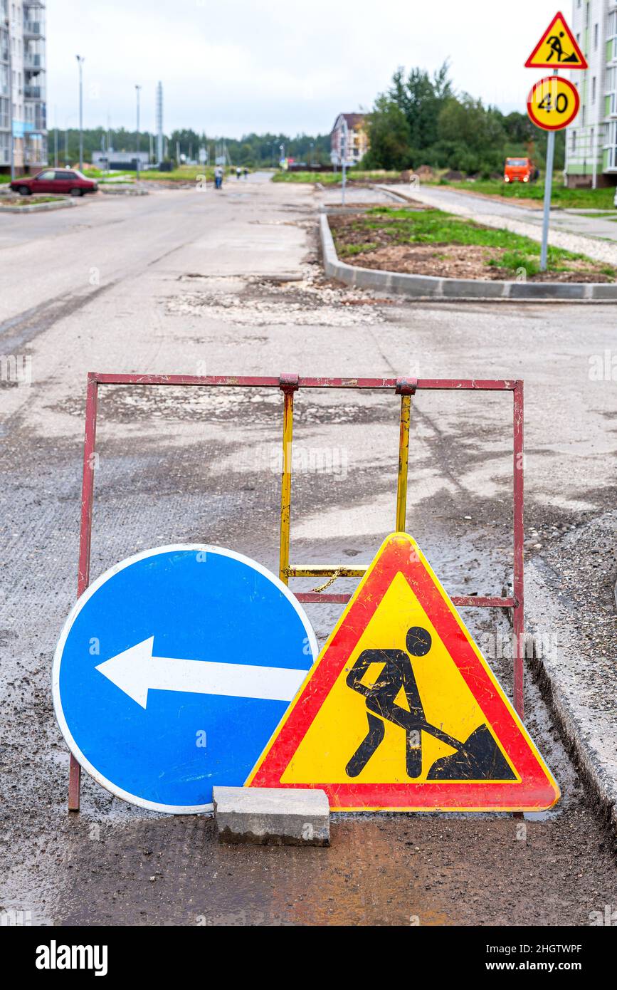 Road works traffic sign at the city street. Under construction road ...