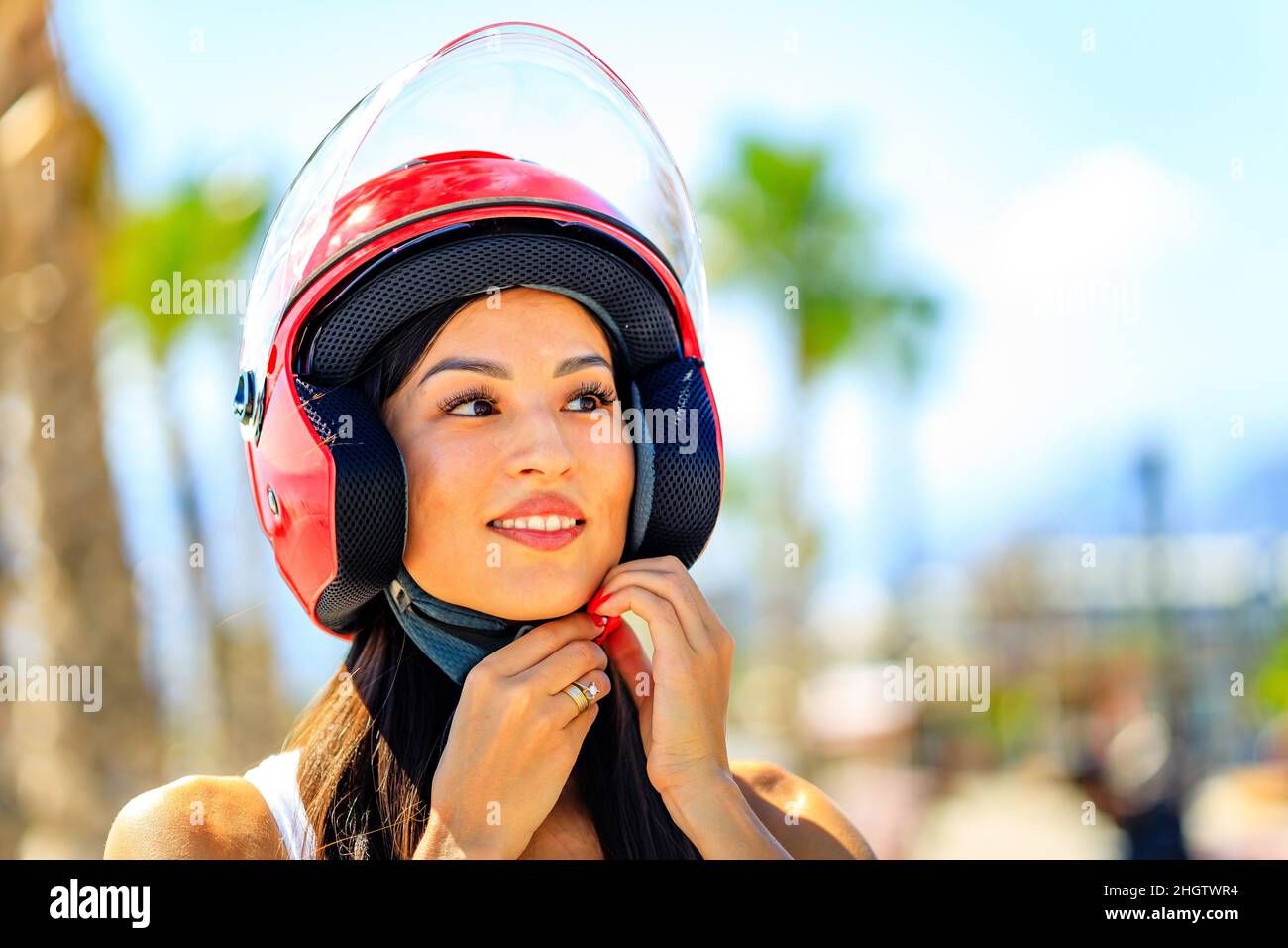 Female motor scooter rider hi-res stock photography and images - Alamy