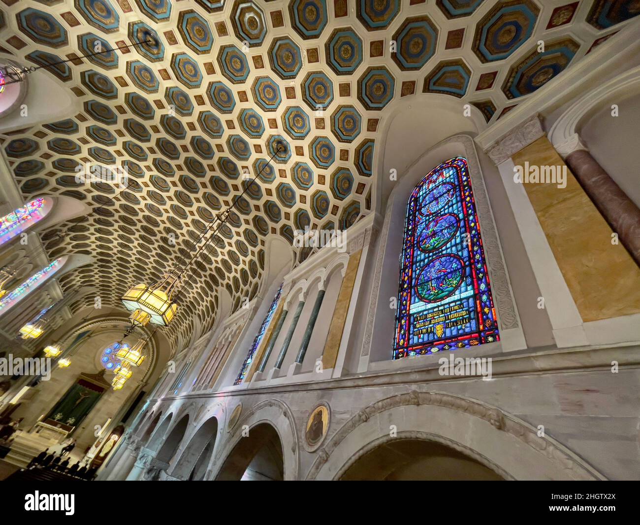 Catholic Cathedral Ornate ceiling with stained glass windows Stock ...