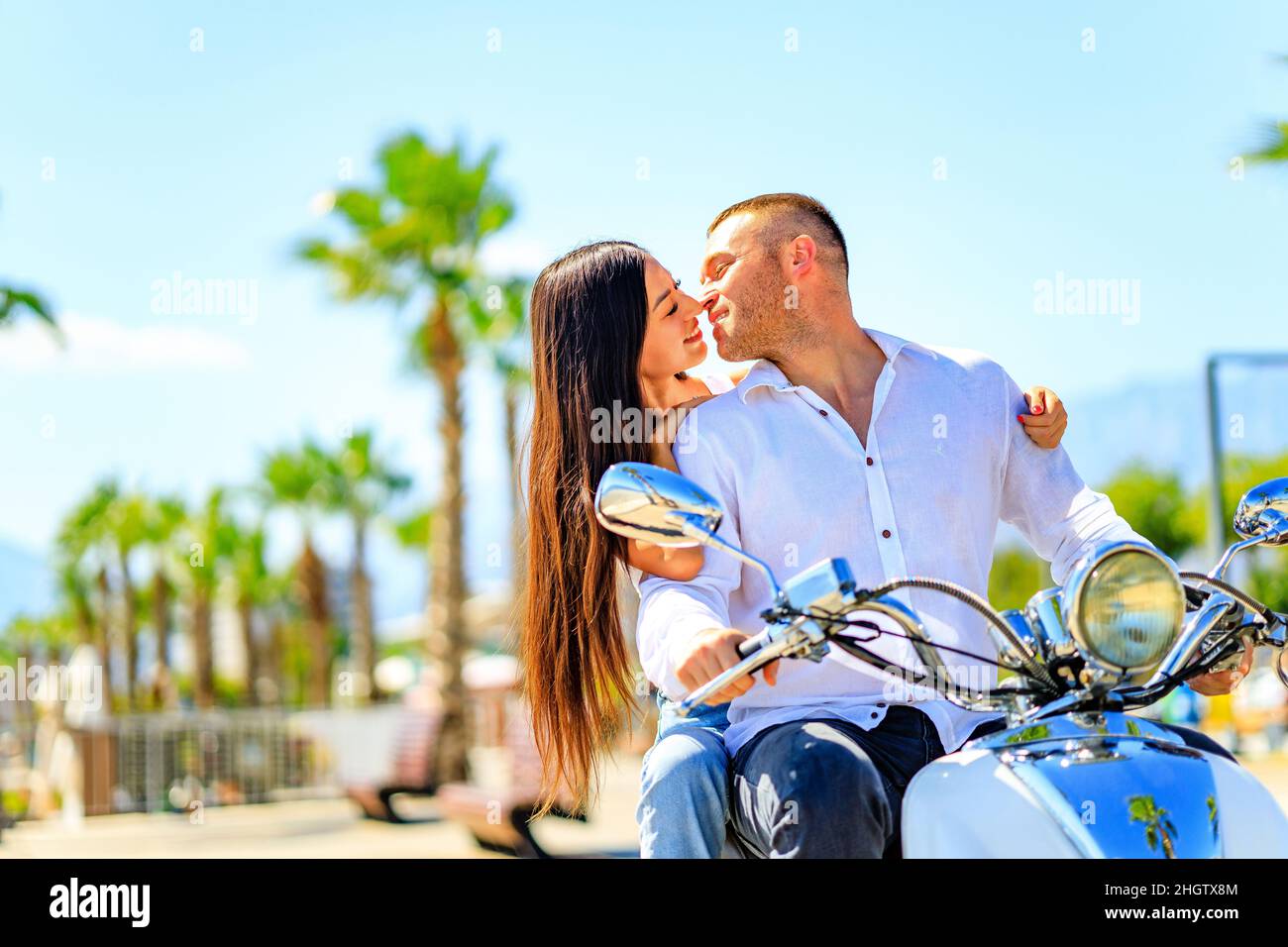 Romantic couple on motorbike hi-res stock photography and images - Alamy