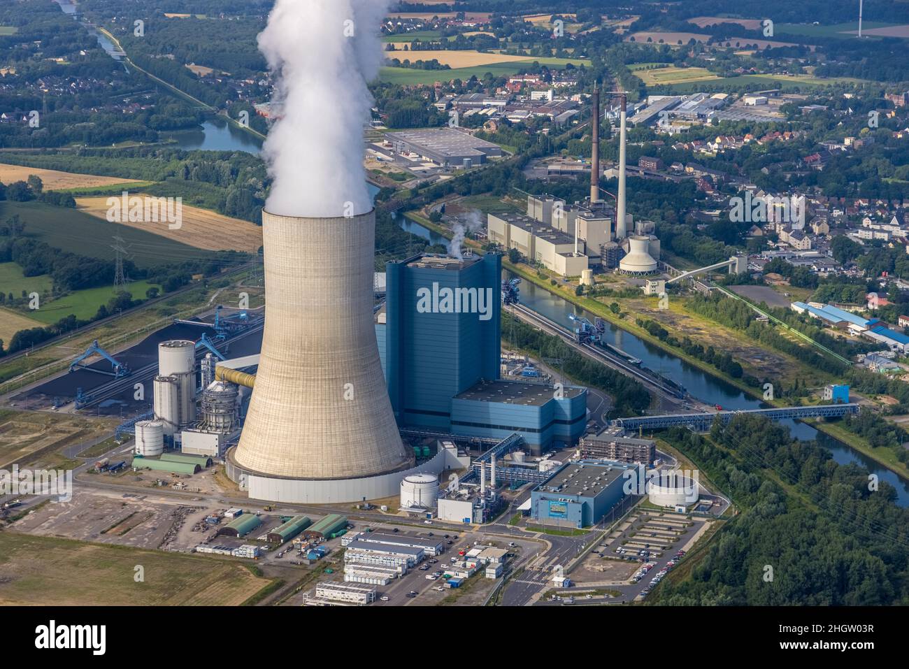 Aerial view of the power plant facilities and exhaust towers of the ...