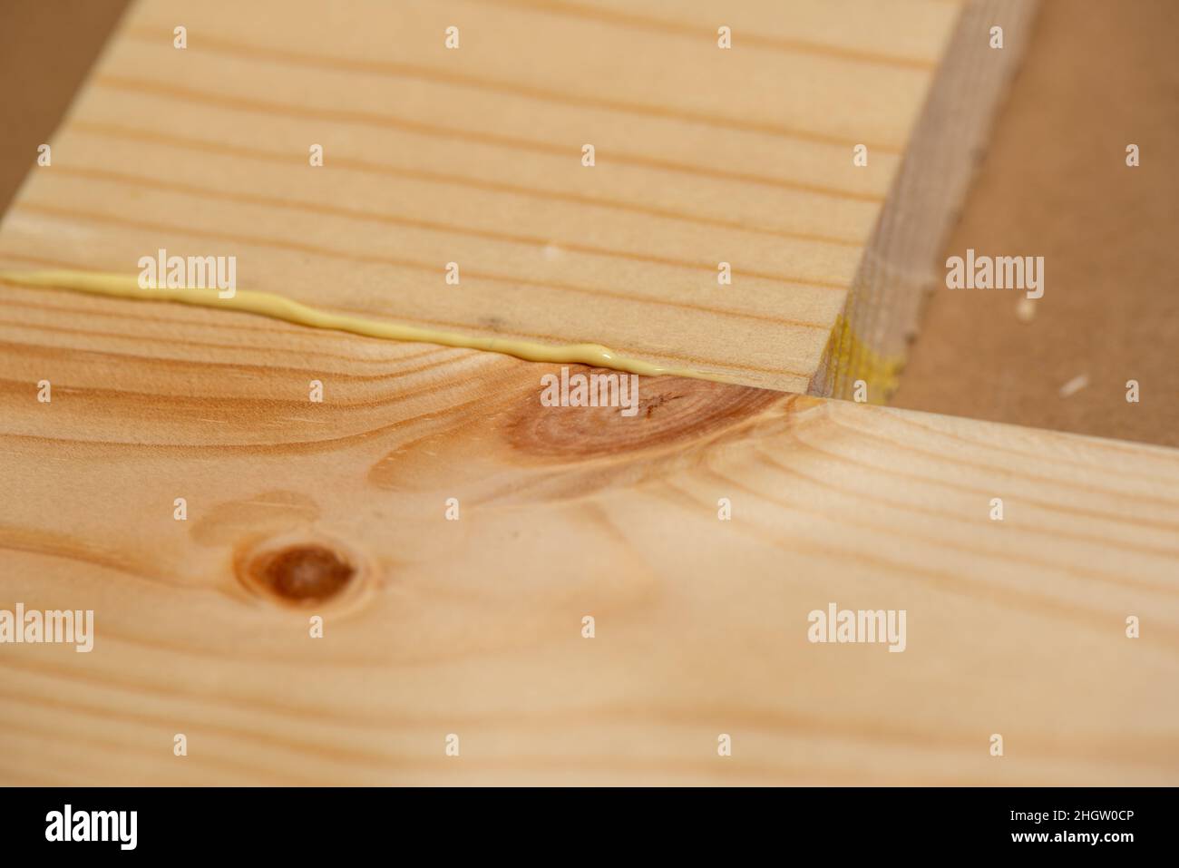 Woodworking. Wood working project 90 degree butt joint with excess glue ...