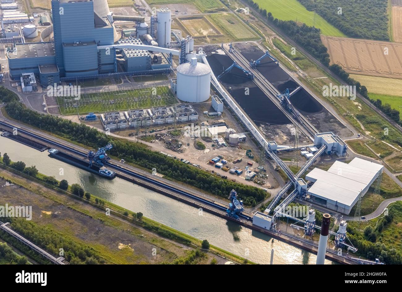 Aerial view of the power plant facilities and exhaust towers of the ...