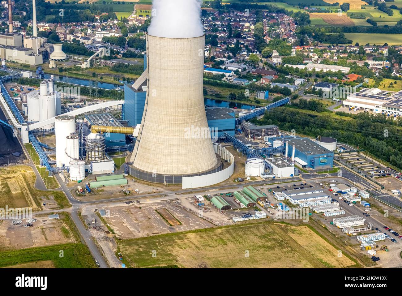 Aerial view of the power plant facilities and exhaust towers of the ...