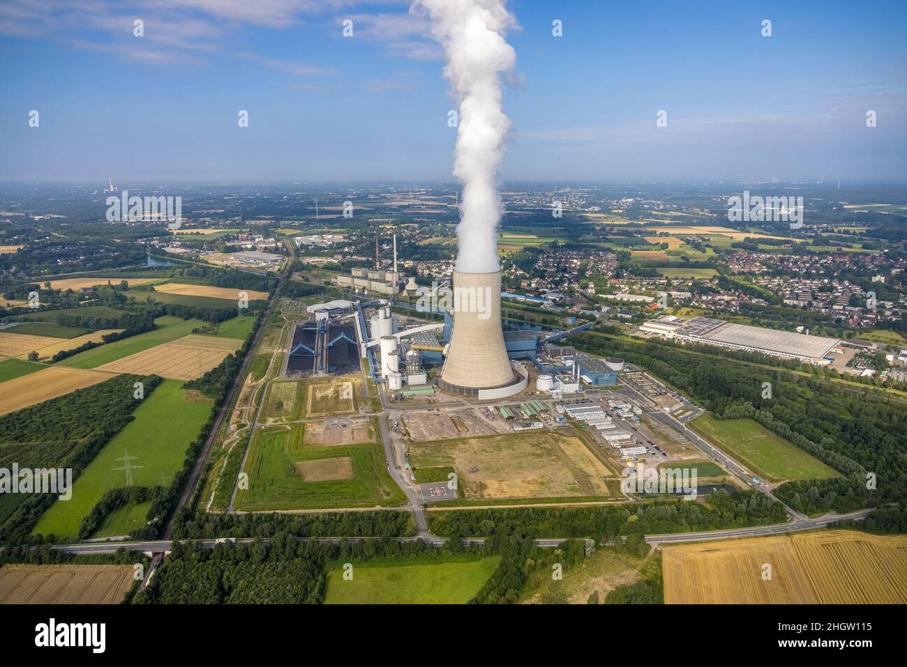 Aerial view of the power plant facilities and exhaust towers of the ...
