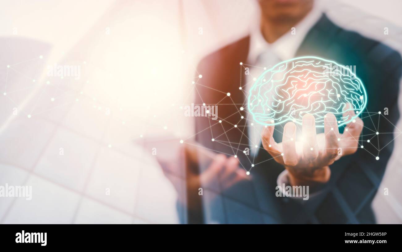 Businessman touch brain icon and line control in graph Screen Icon of a ...