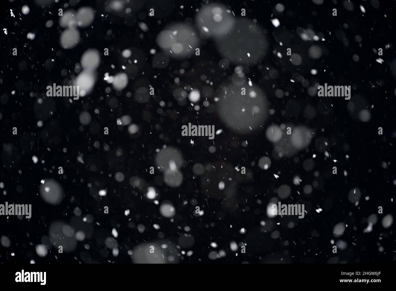 Snowfall on black background. Snowfall in the night sky, real ...