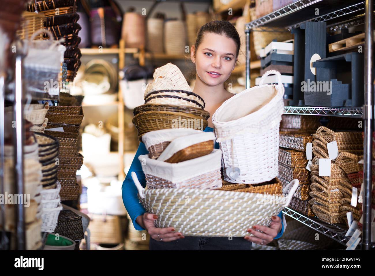customer standing with wicker basket Stock Photo - Alamy