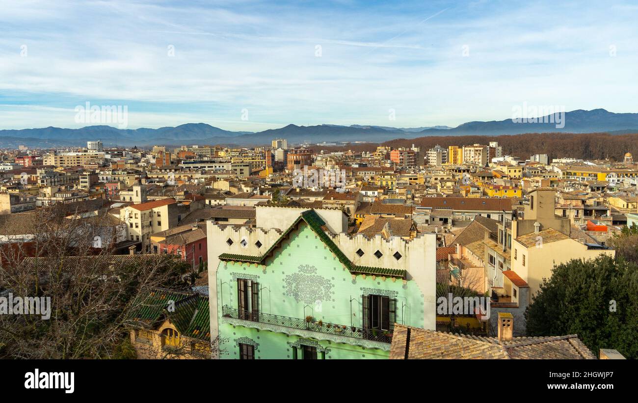 Girona cityscape with the mountains at the background Stock Photo - Alamy