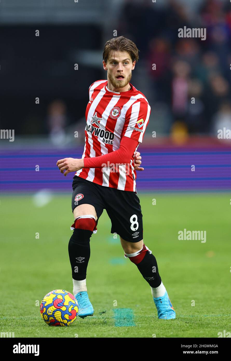 London, England, 22nd January 2022. Mathias Jensen of Brentford during ...