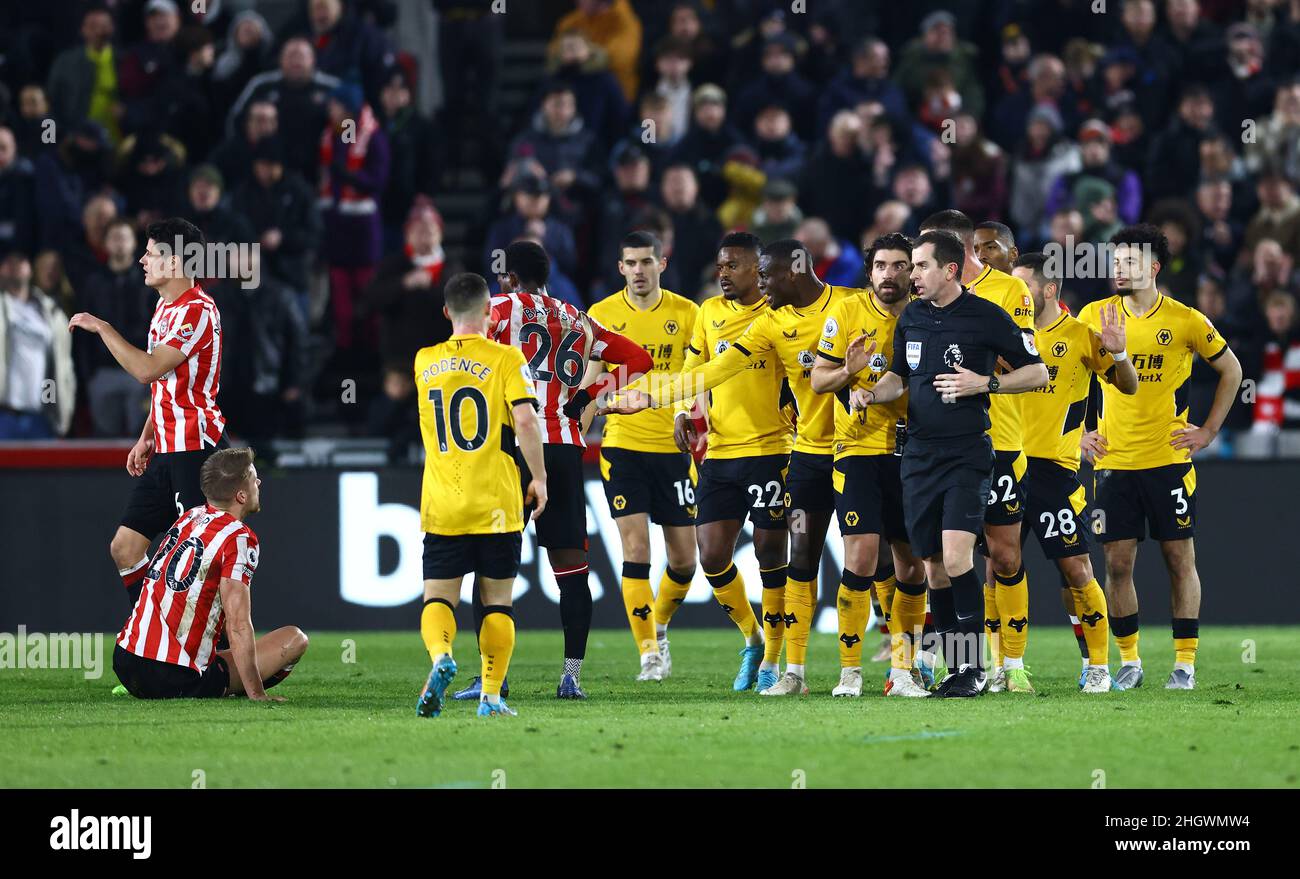 London, England, 22nd January 2022. Wolves players complain to referee ...