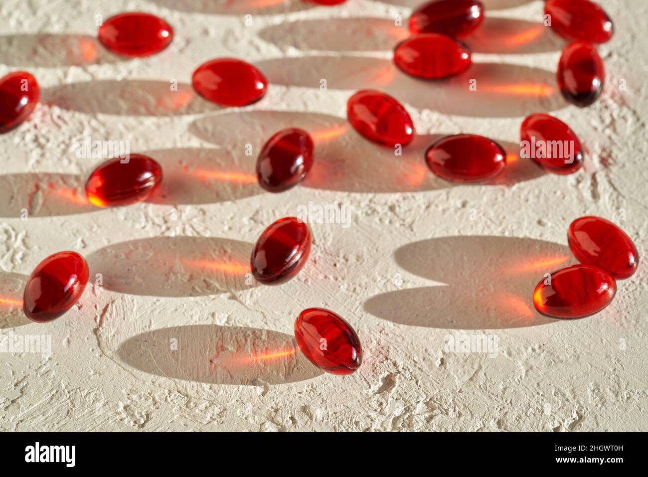 Red krill oil pills on a white background - nutritional supplement rich ...