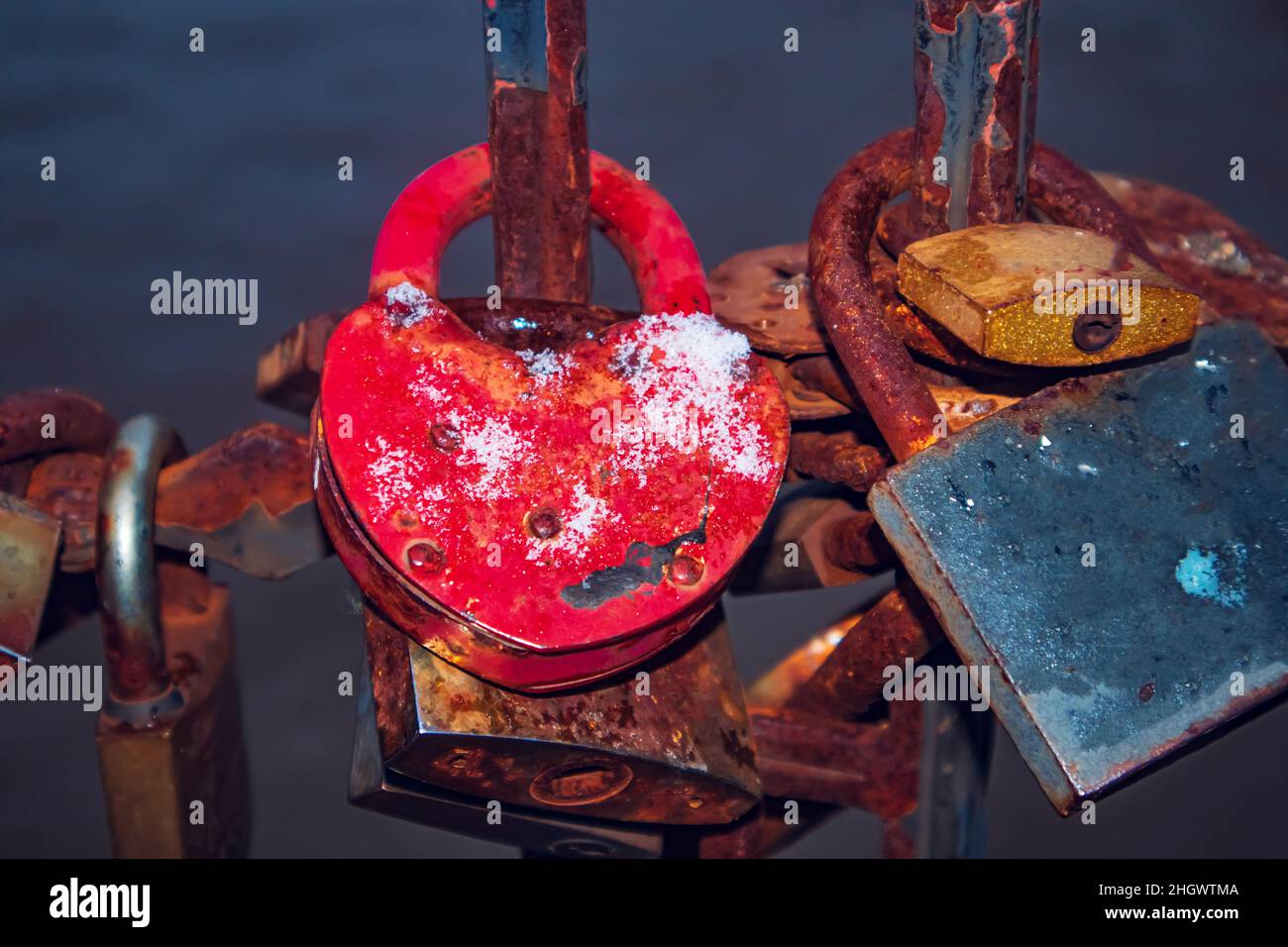 Rusty love red romantic lock on a bridge. Russia, Kaliningrad - January ...