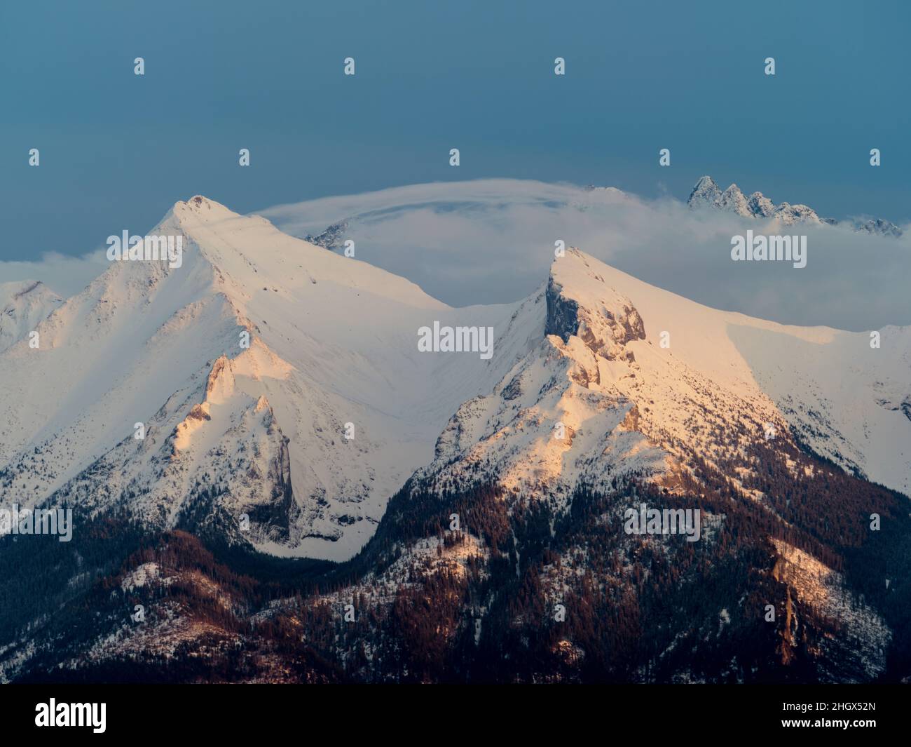 Winter landscape of the Tatra Mountains. View of the snow-capped peaks ...