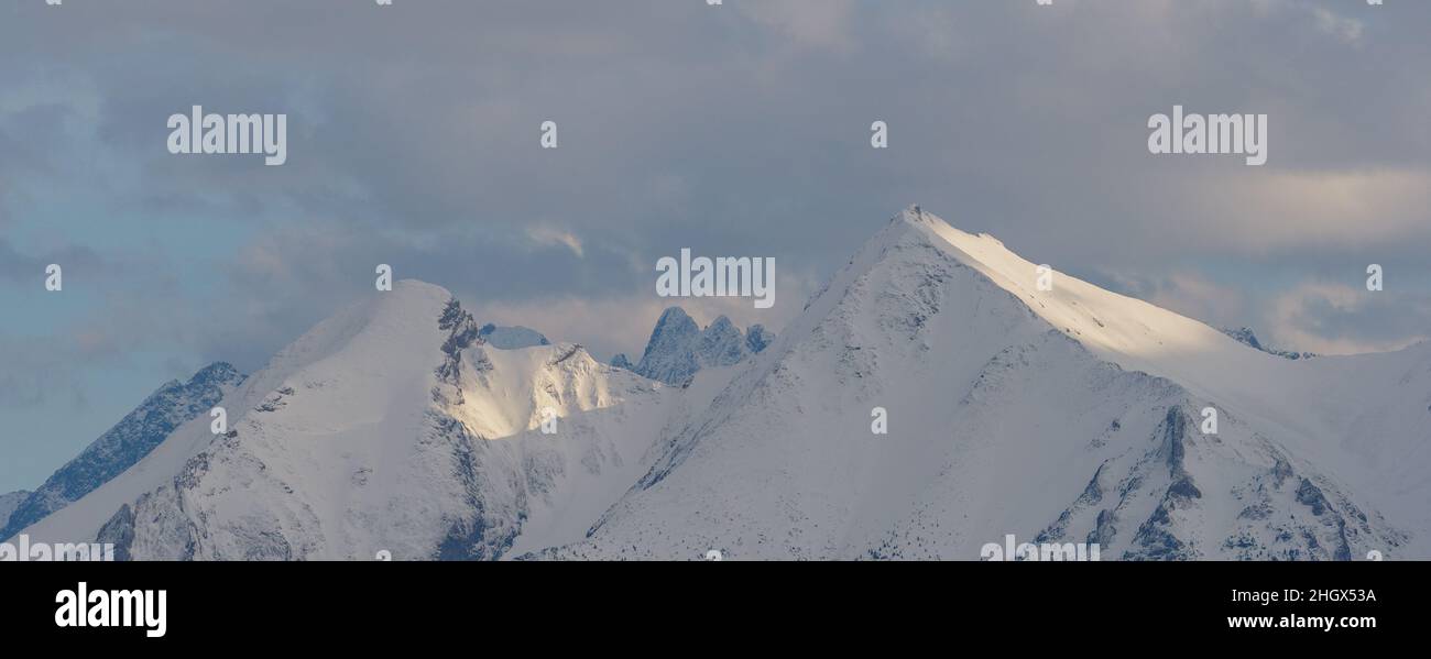 Winter landscape of the Tatra Mountains. View of the snow-capped peaks ...