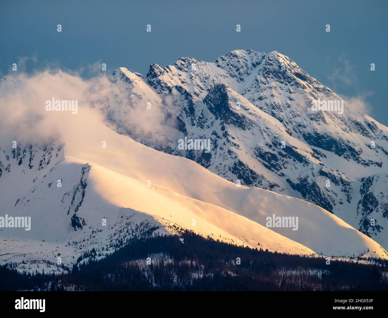 Winter landscape of the Tatra Mountains. View of the snow-capped peaks ...