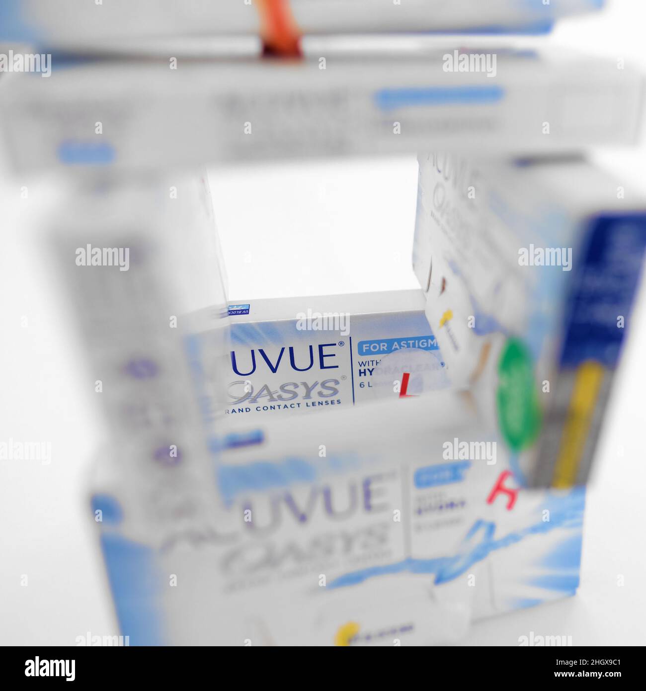 Boxes of Acuvue Oasys Brand Contact Lenses for astigmatism on a white ...