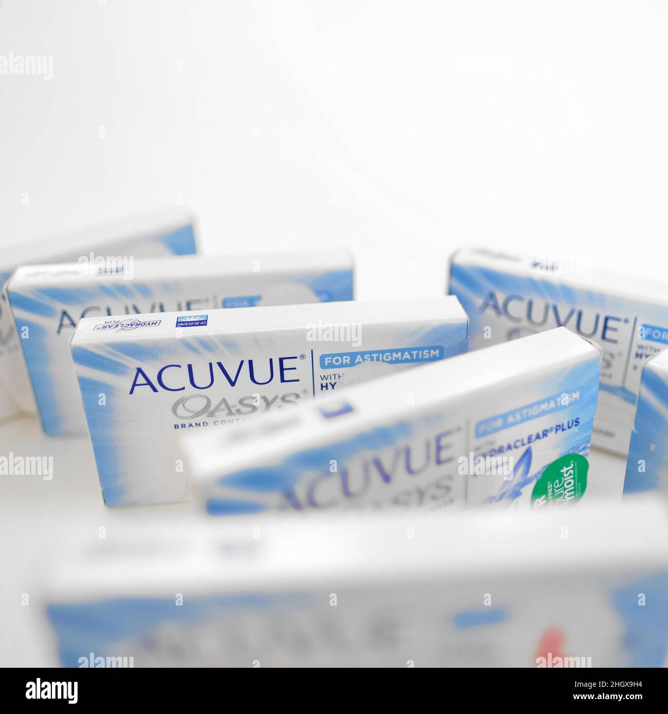 Boxes of Acuvue Oasys Brand Contact Lenses for astigmatism on a white ...