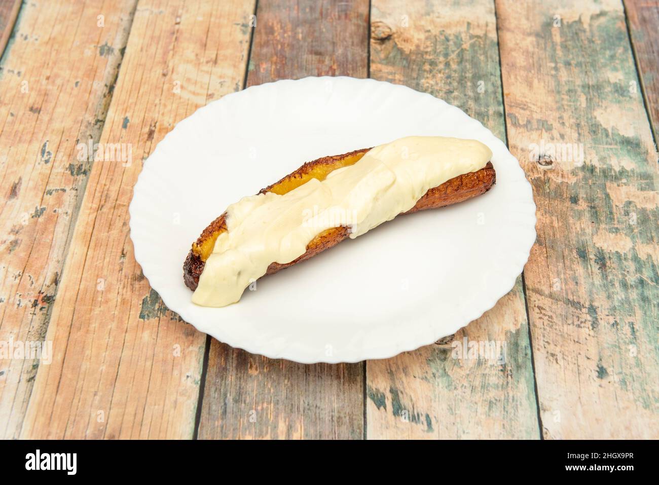 ripe banana with cheese. Many consider it a dessert, others the best ...